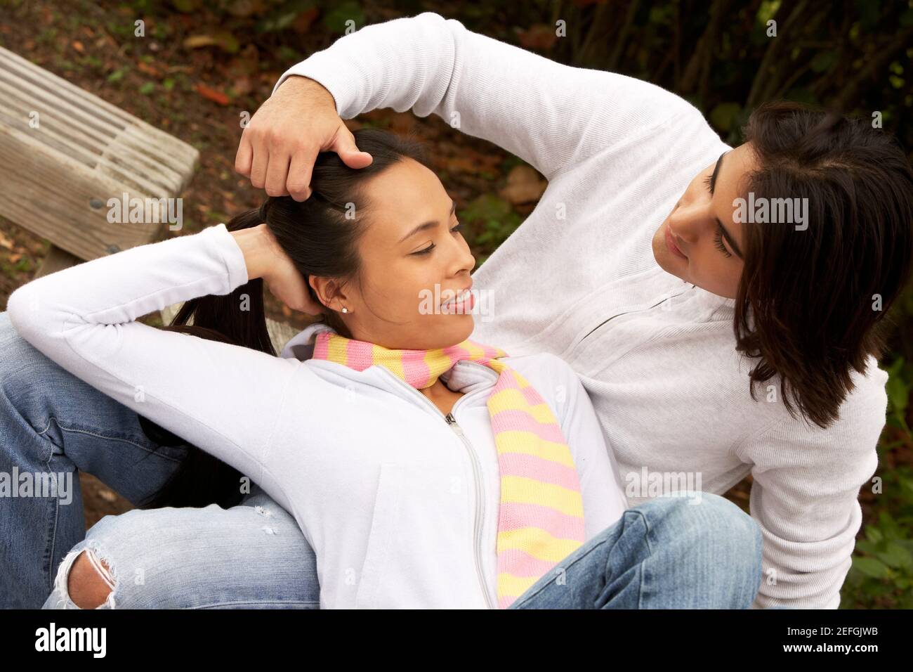 Man lying on lap of a woman hi-res stock photography and images - Alamy