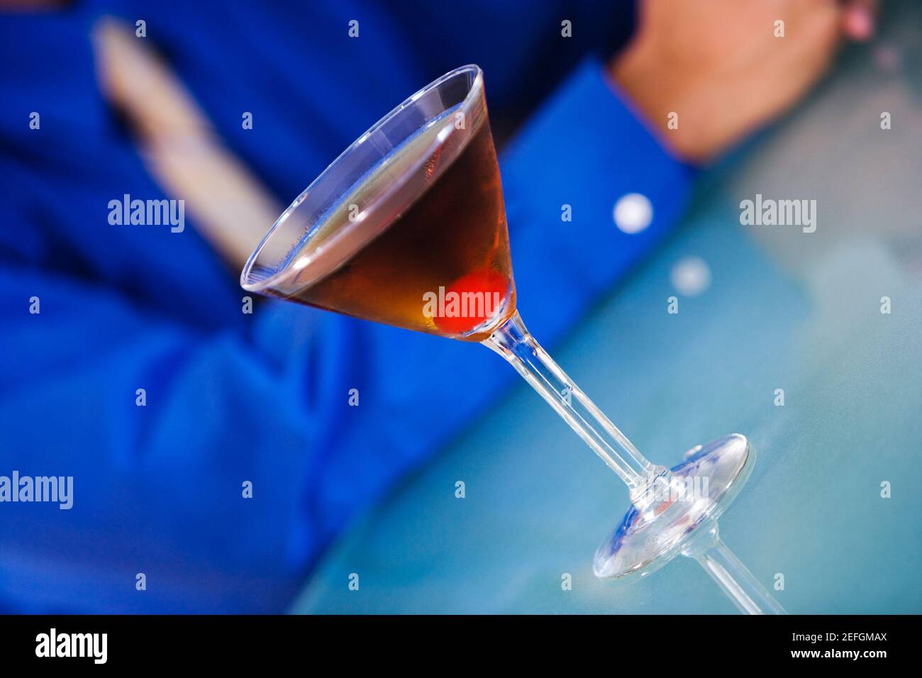 Close-up of a glass of martini on a bar counter Stock Photo - Alamy