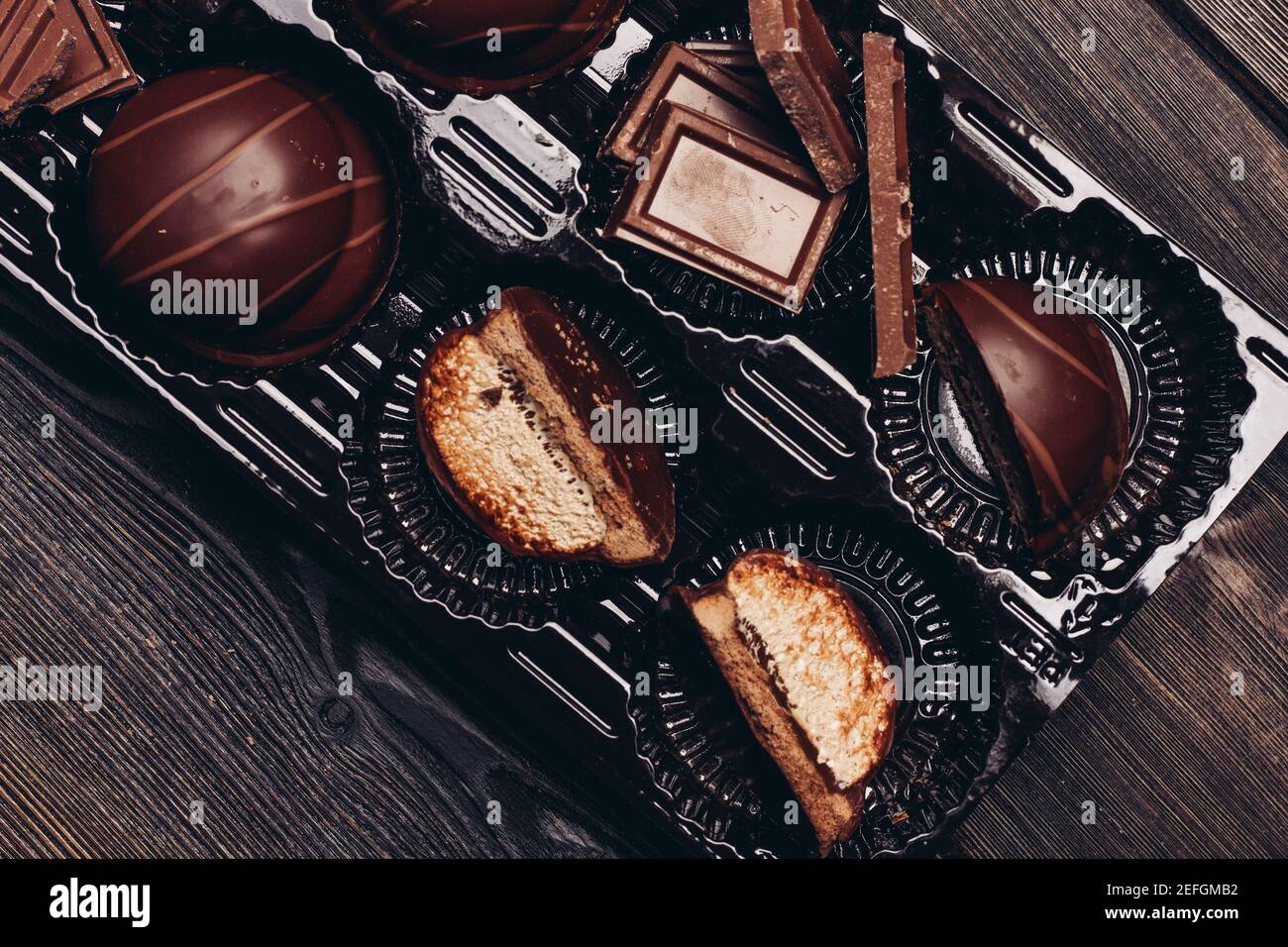 chocolate and pastries on wooden table background image texture ...
