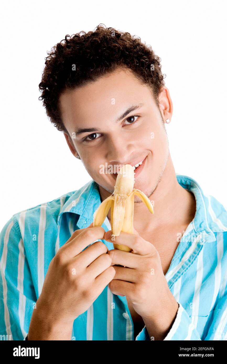 Close up man eating banana hi-res stock photography and images - Alamy