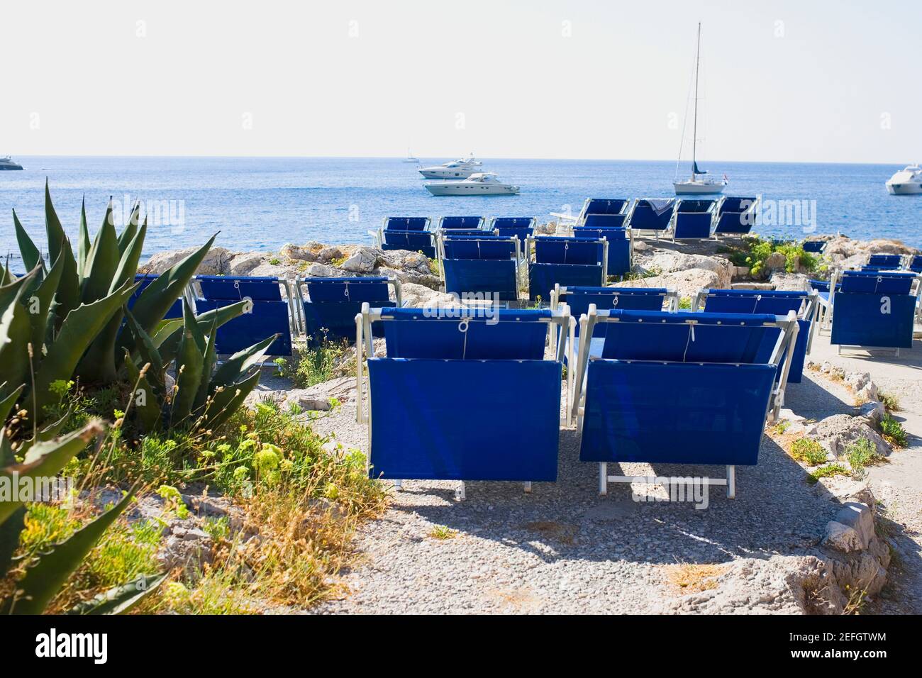 Deck chairs on the beach, Capri, Campania, Italy Stock Photo - Alamy