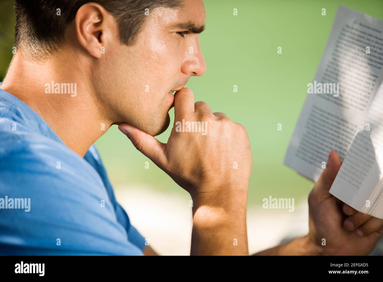 Reading profile book adult hi-res stock photography and images - Alamy