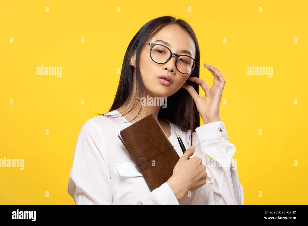 women with glasses notepad in the hands of an official office lifestyle ...