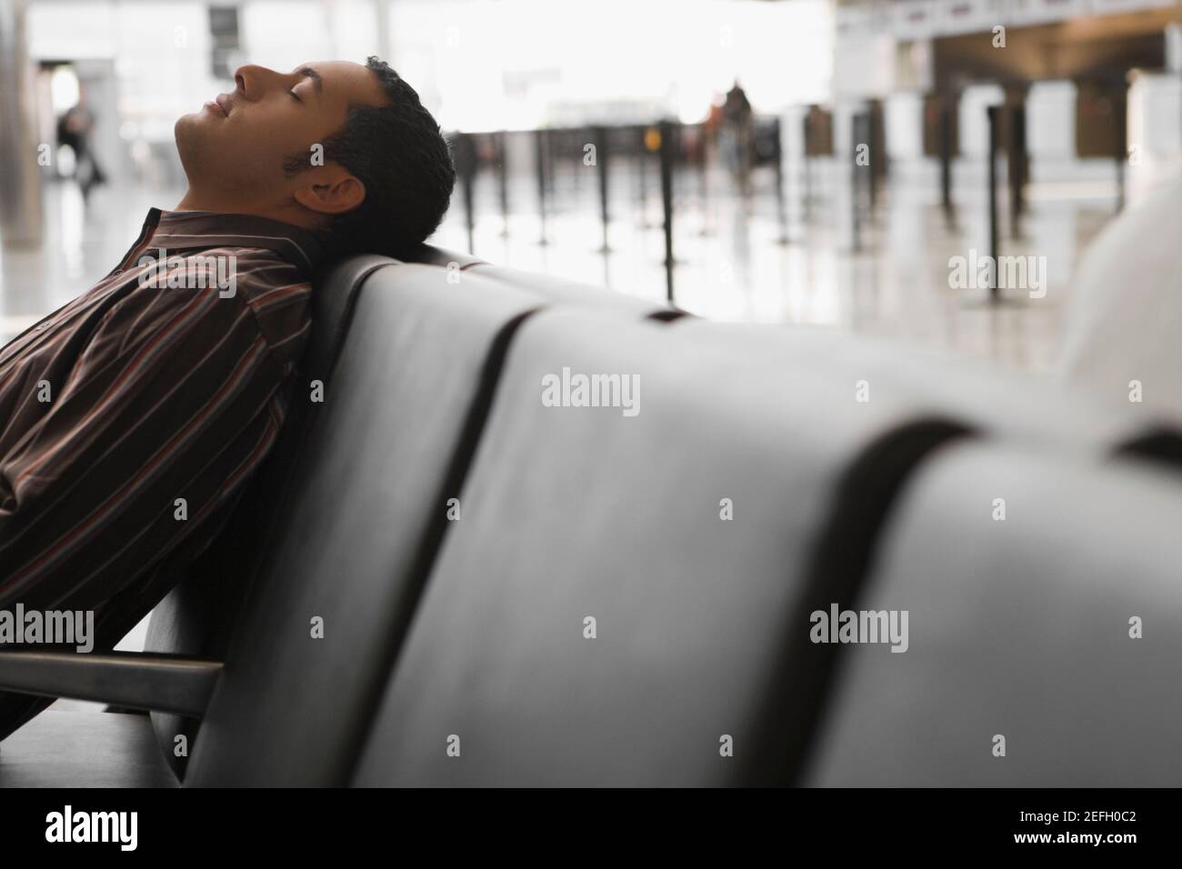 Woman reclining on bench hi-res stock photography and images - Alamy