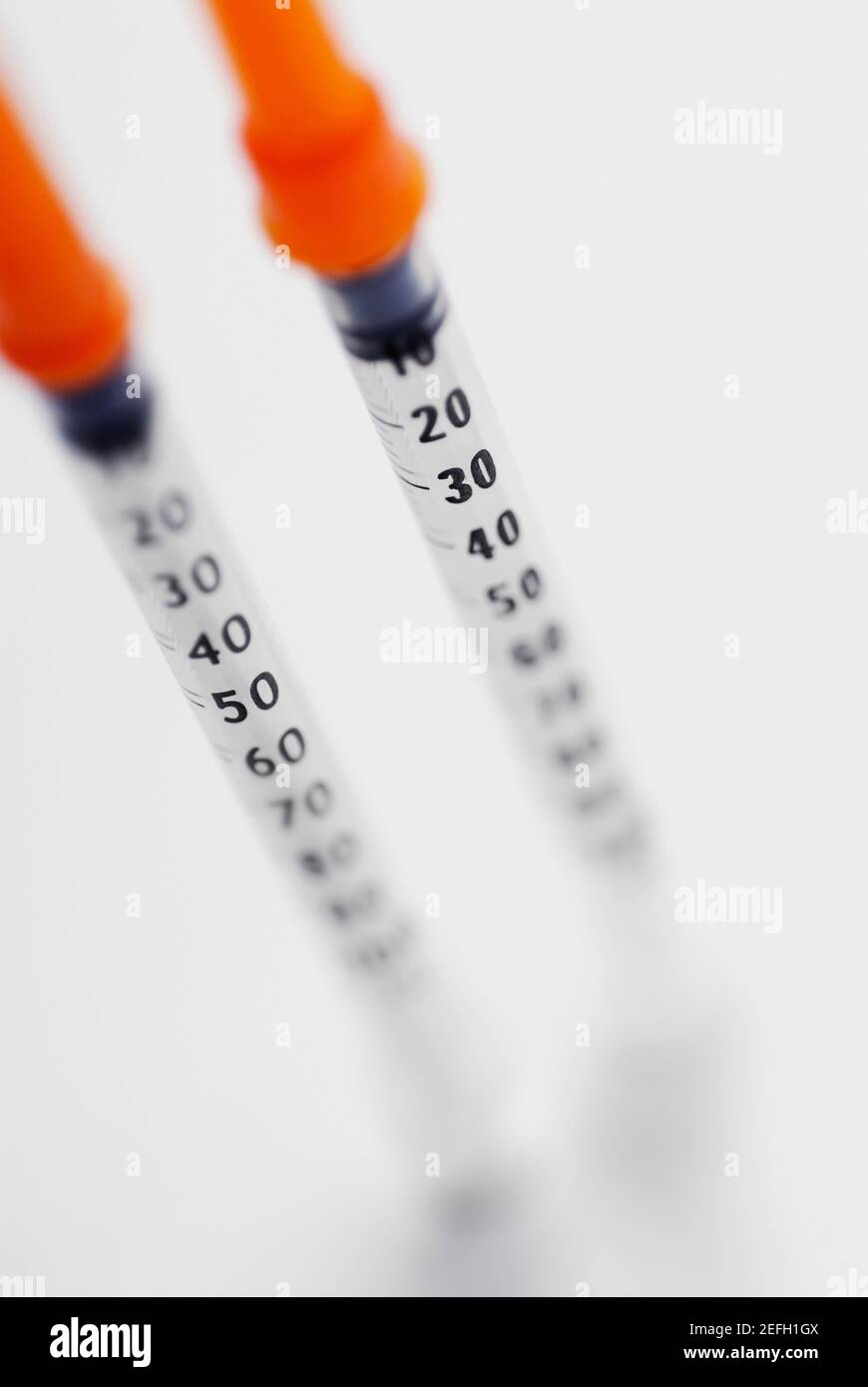 Close up of two syringes Stock Photo - Alamy