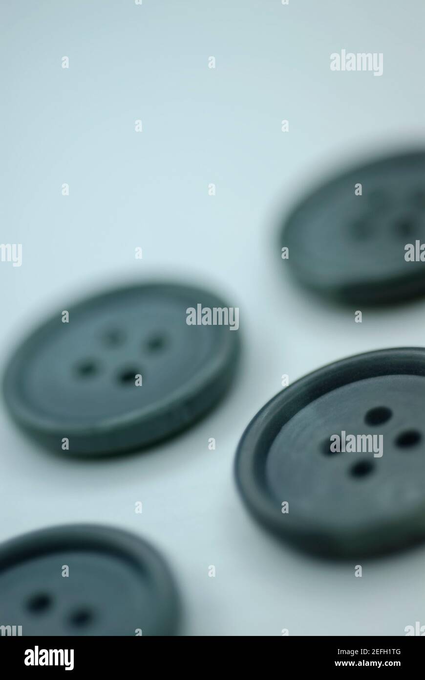 Close up of four buttons Stock Photo - Alamy