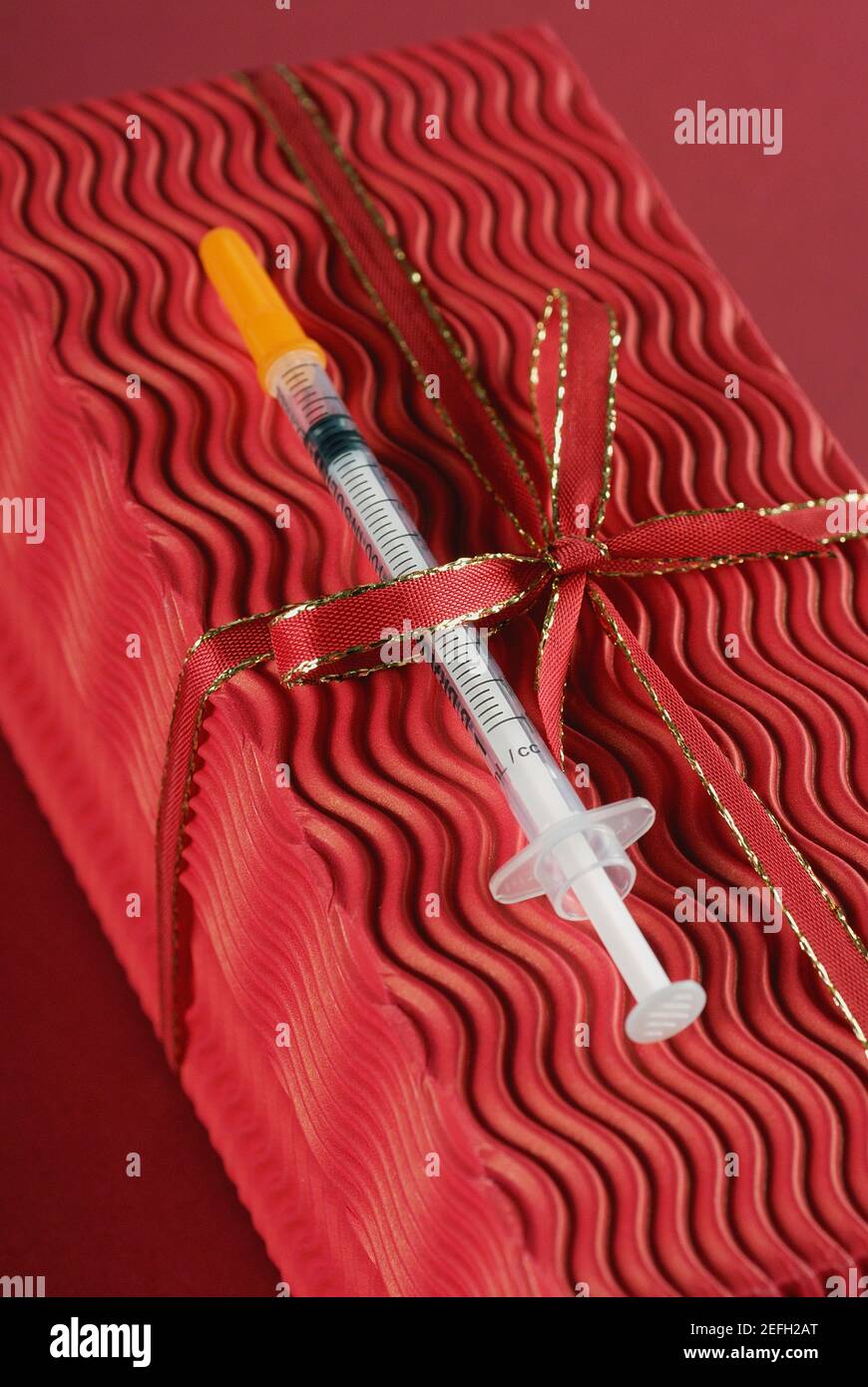 Syringe on a colored background hi-res stock photography and images - Alamy
