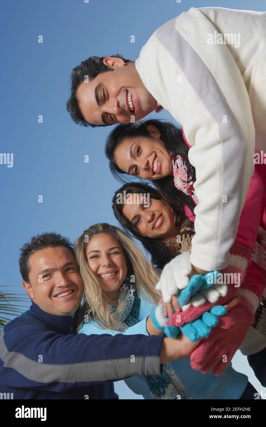 One hand on top of the other hi-res stock photography and images - Alamy