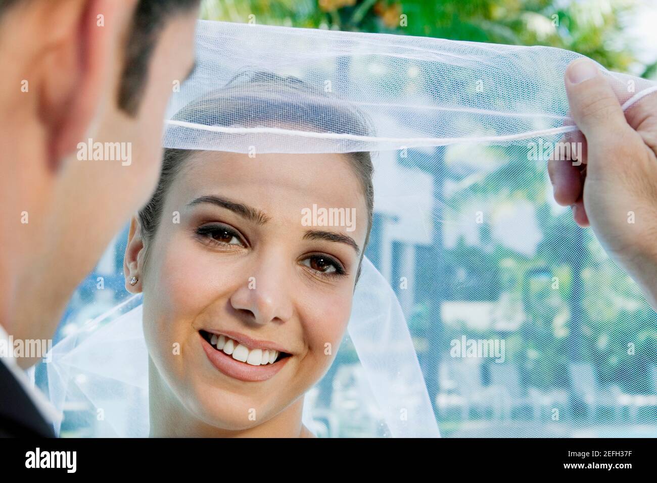 Groom Lifting Veil Bride High Resolution Stock Photography and Images ...
