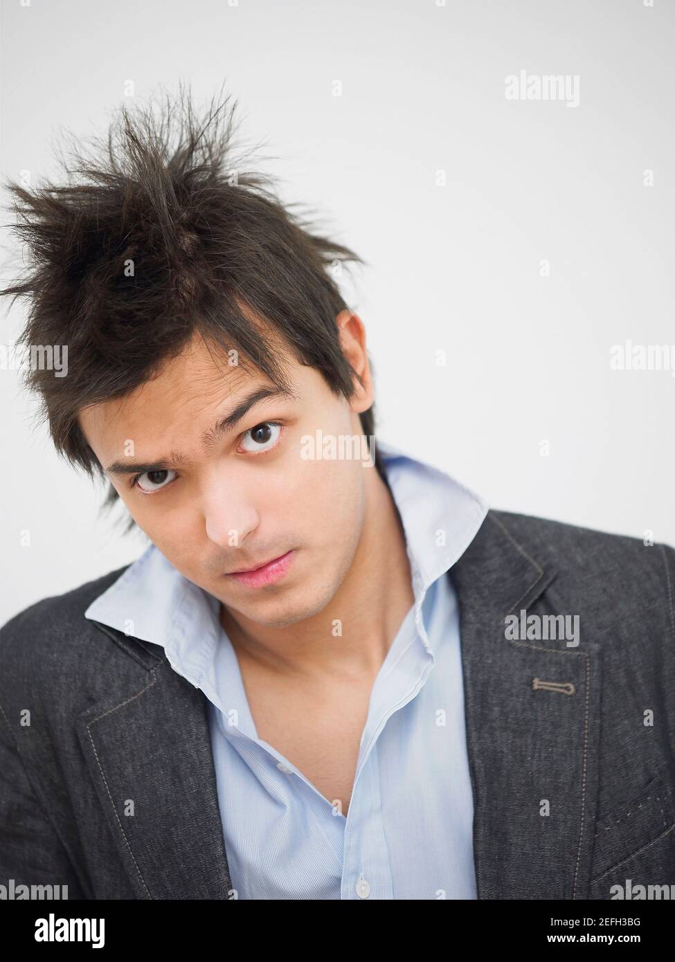 Serious man raising head up hi-res stock photography and images - Alamy