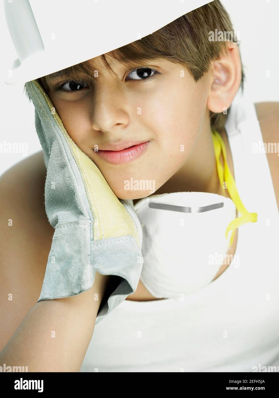 Portrait of a boy with his hand on his cheek Stock Photo - Alamy