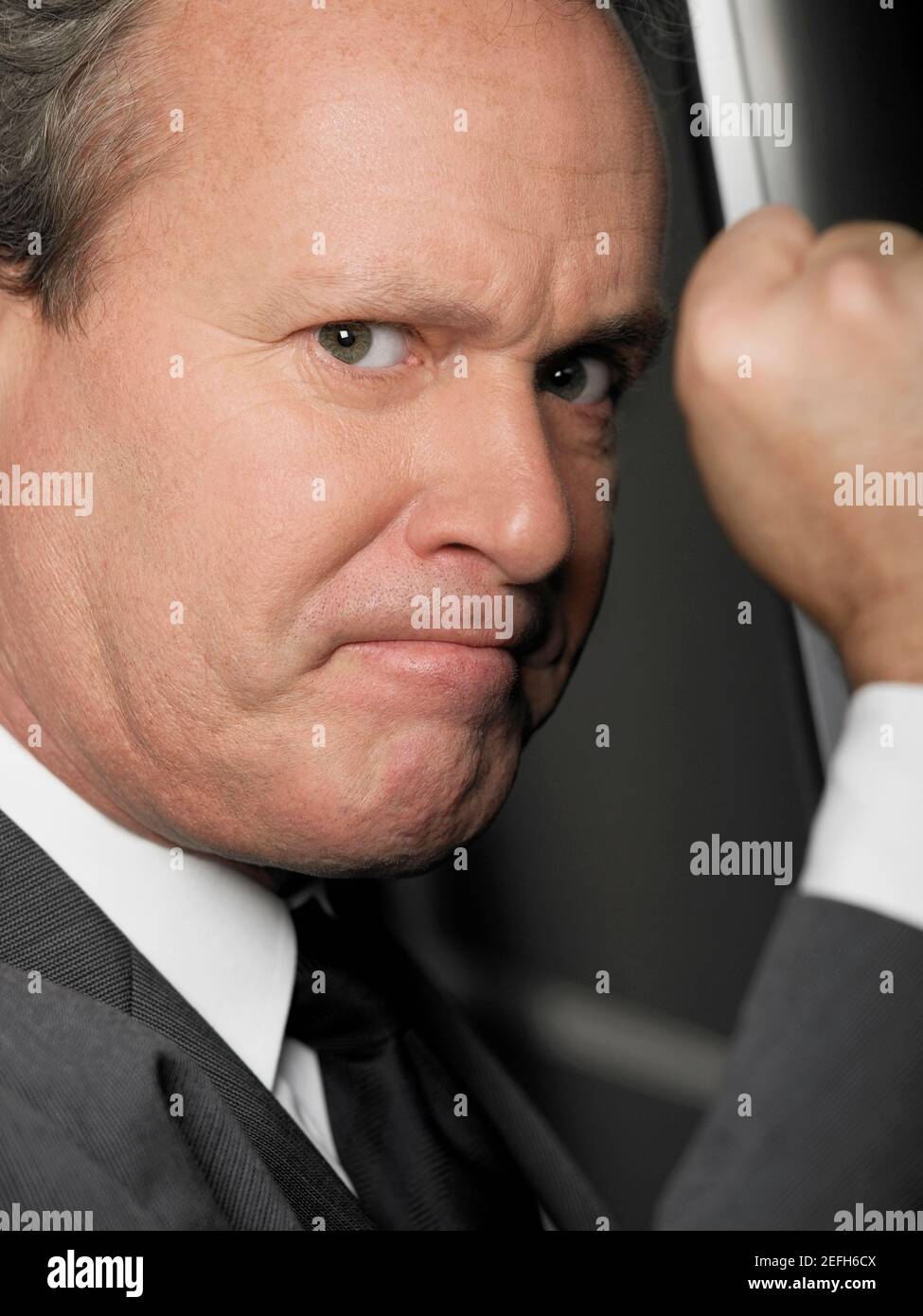 Close up on angry businessman hi-res stock photography and images - Alamy