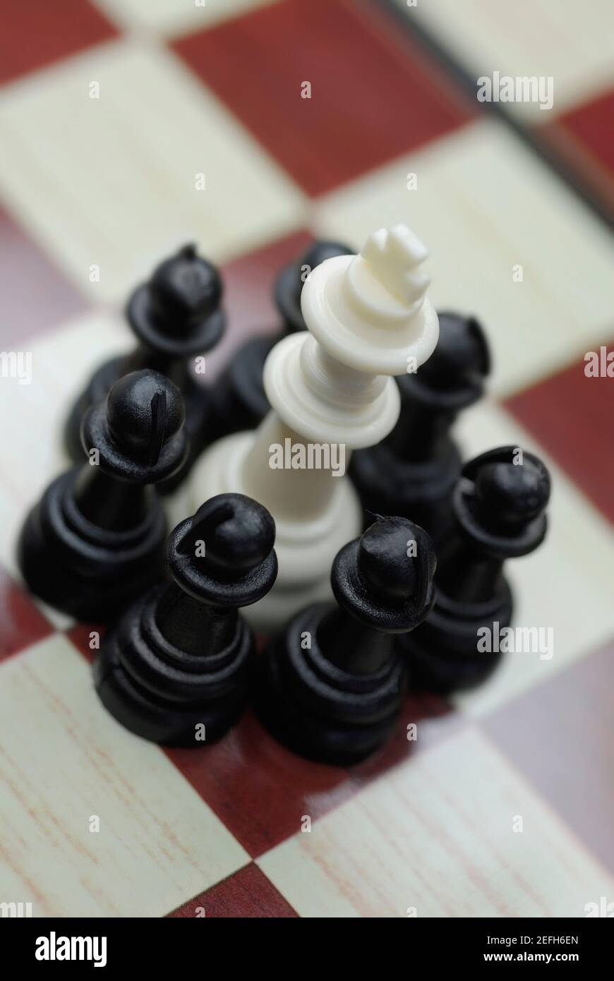 King surrounded chessboard hi-res stock photography and images - Alamy