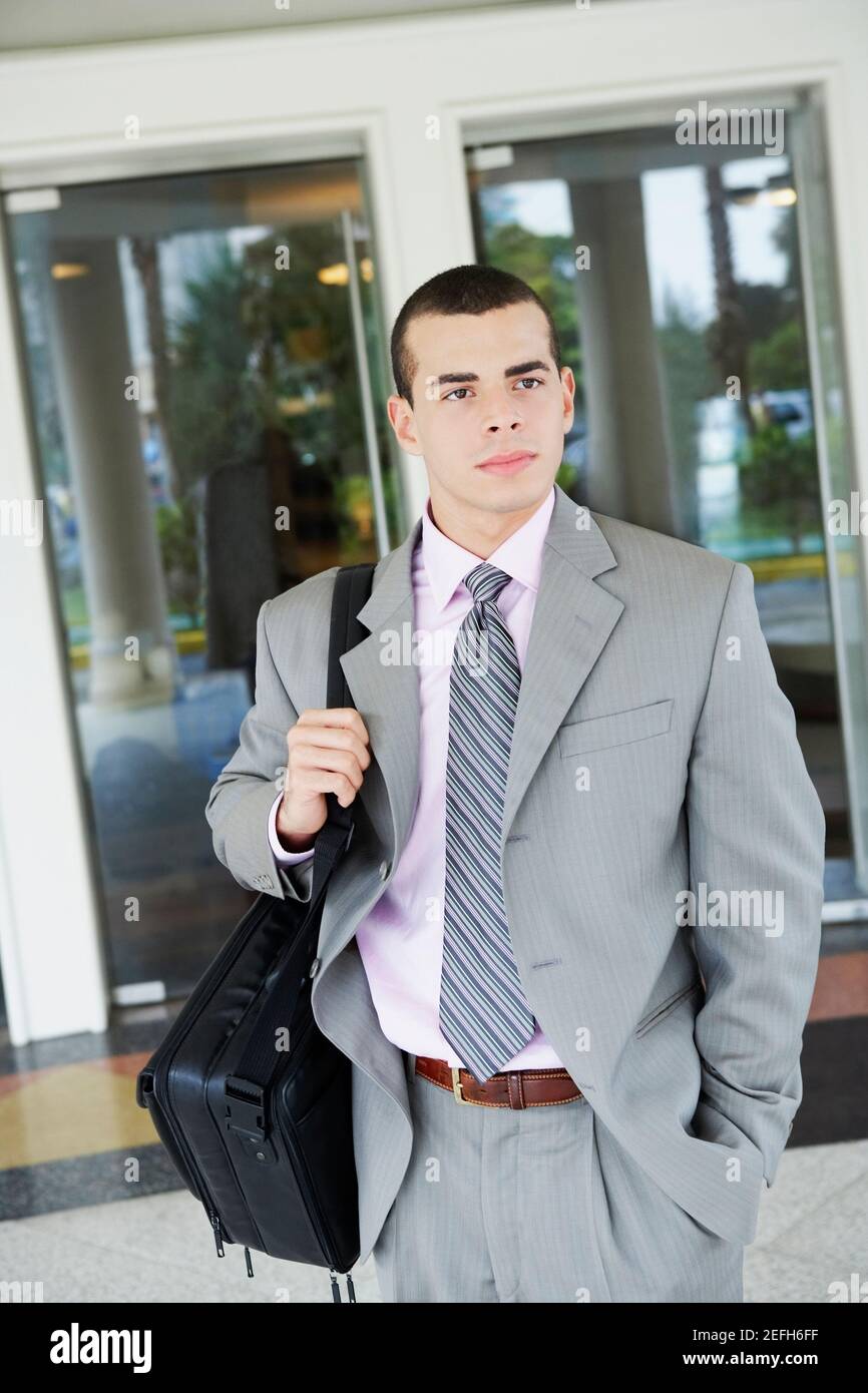 In front of door business luggage hi-res stock photography and images ...