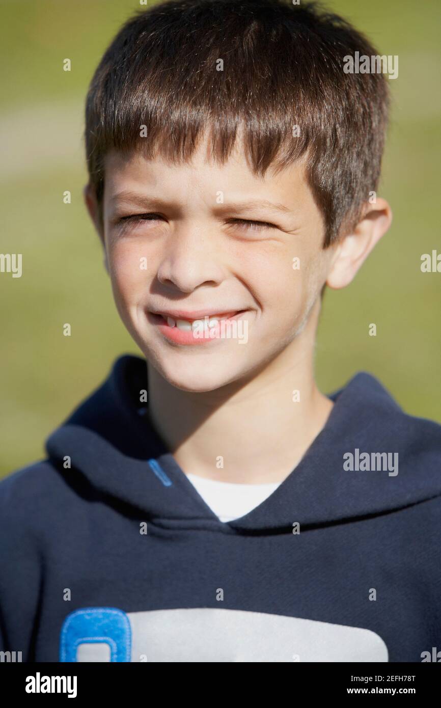 Boy Smirking High Resolution Stock Photography and Images - Alamy