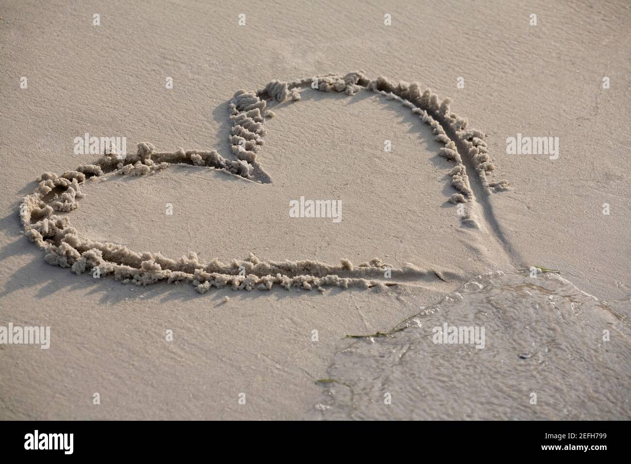 High angle view of a heart shape on the beach Stock Photo - Alamy