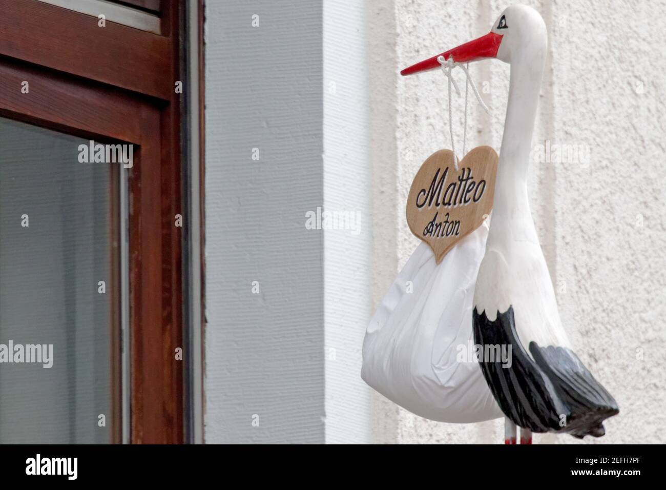 Stork with baby bag as sign for a new born human child Stock Photo - Alamy