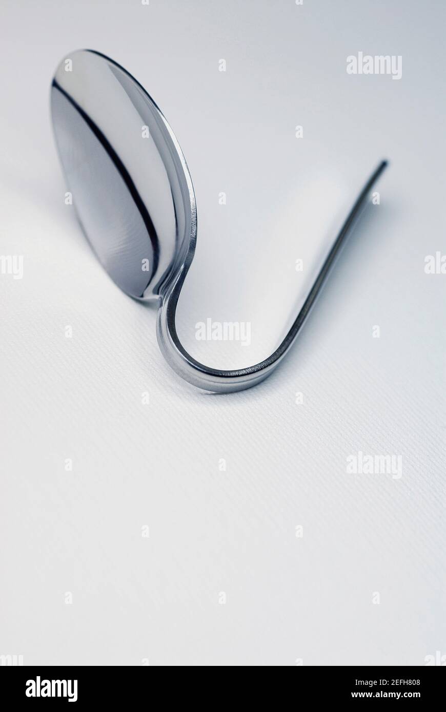 Bent spoon hi-res stock photography and images - Alamy
