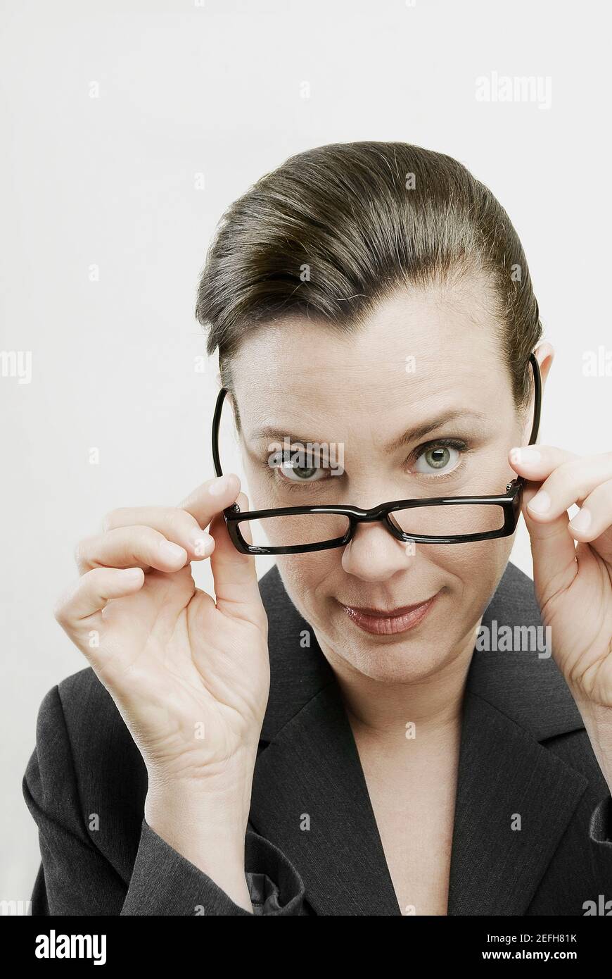 Portrait mature woman adjusting hi-res stock photography and images - Alamy