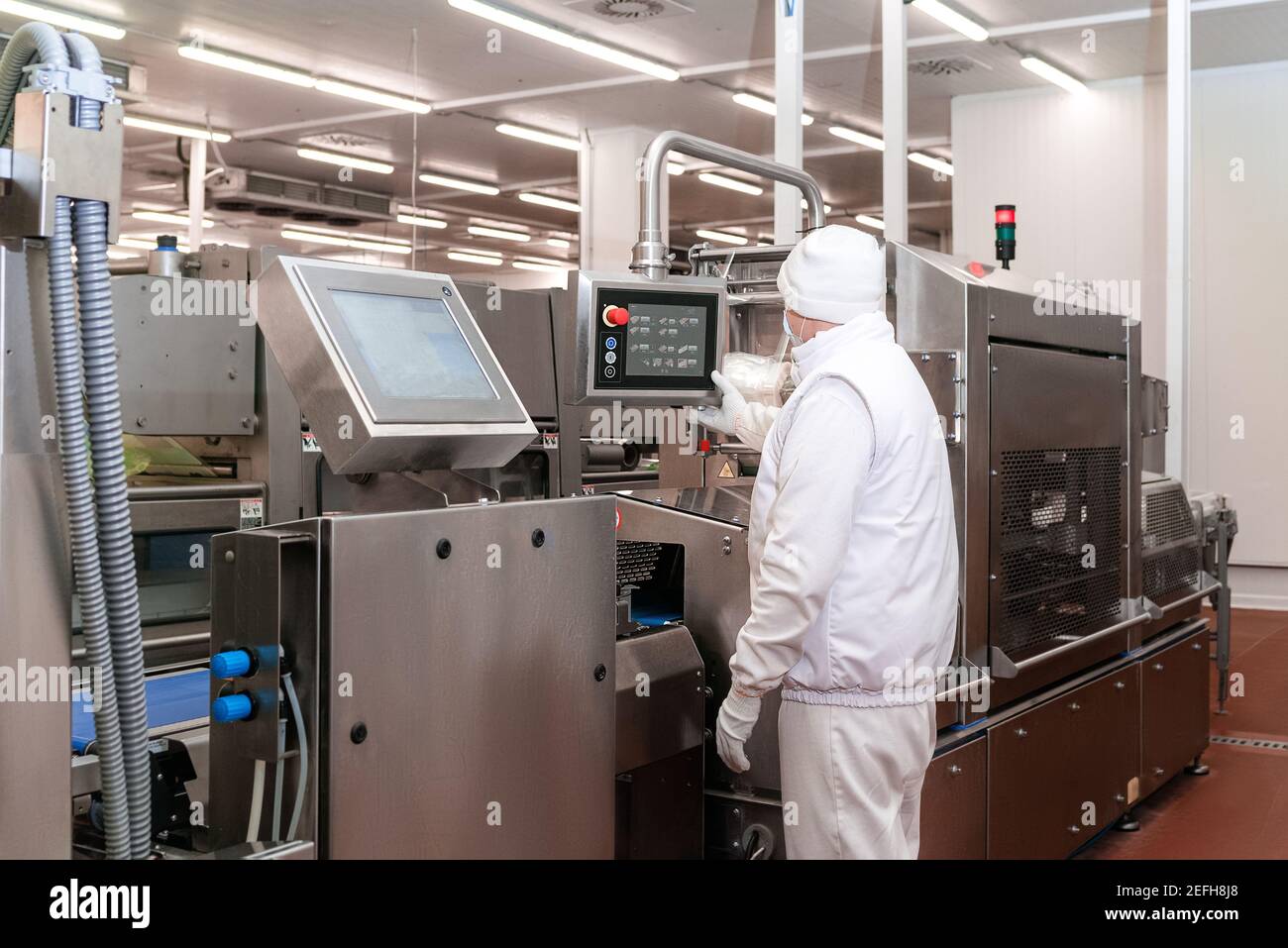 People Working In A Food Factory
