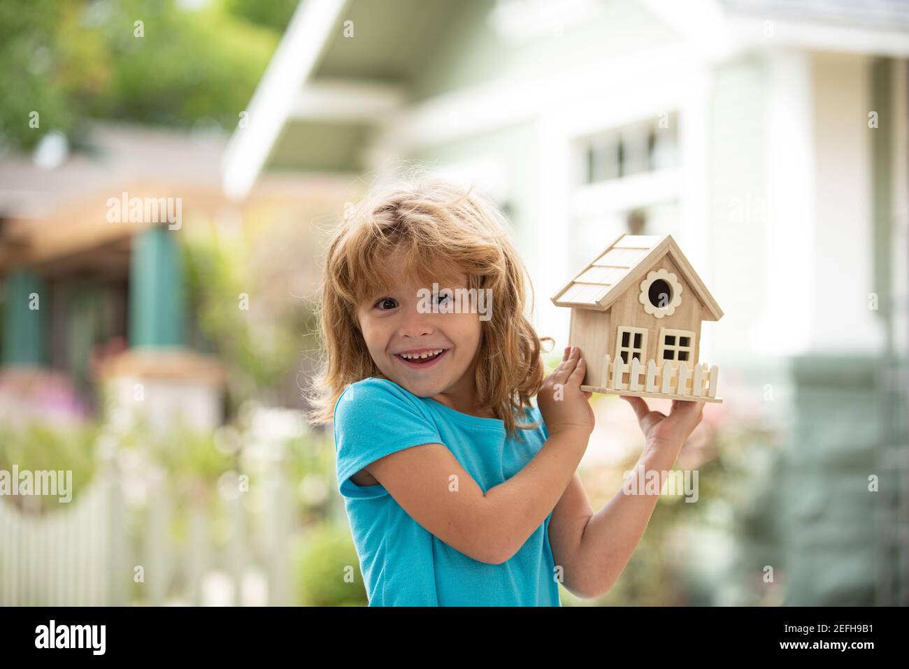 Family house care insurance concept, Home in kids hands. Child boy ...