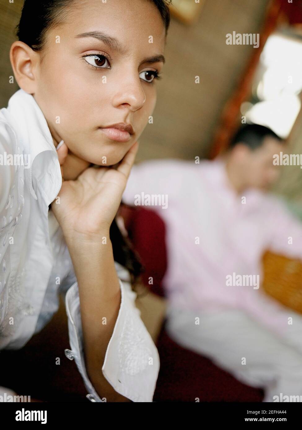 Close up of a teenage girl thinking Stock Photo - Alamy