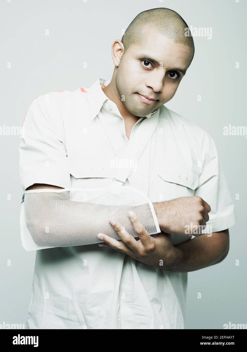 Arm pain hispanic hi-res stock photography and images - Alamy