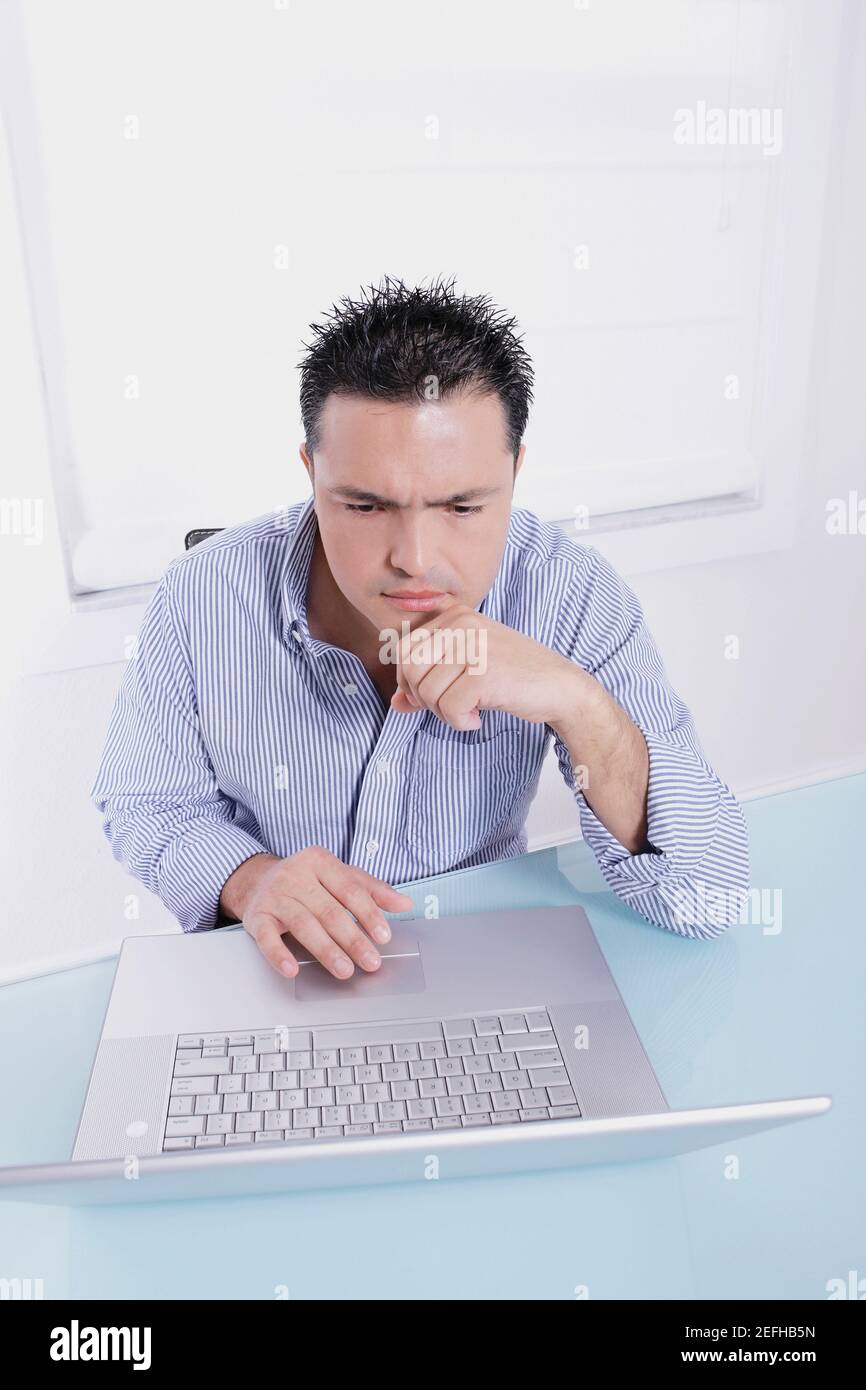Middle aged black man using laptop hi-res stock photography and images ...
