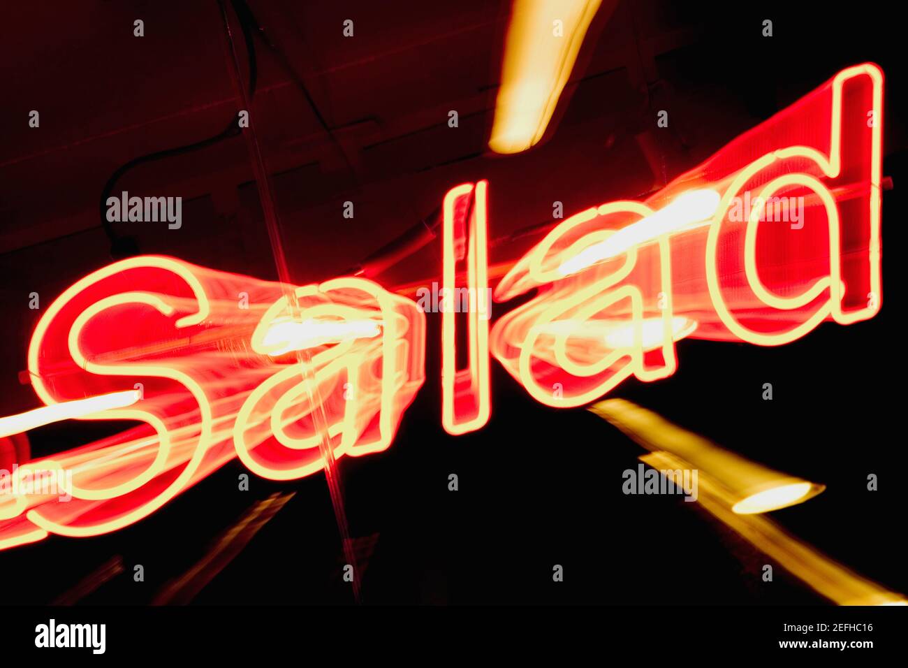 Close up of a neon sign lit up at night Stock Photo - Alamy