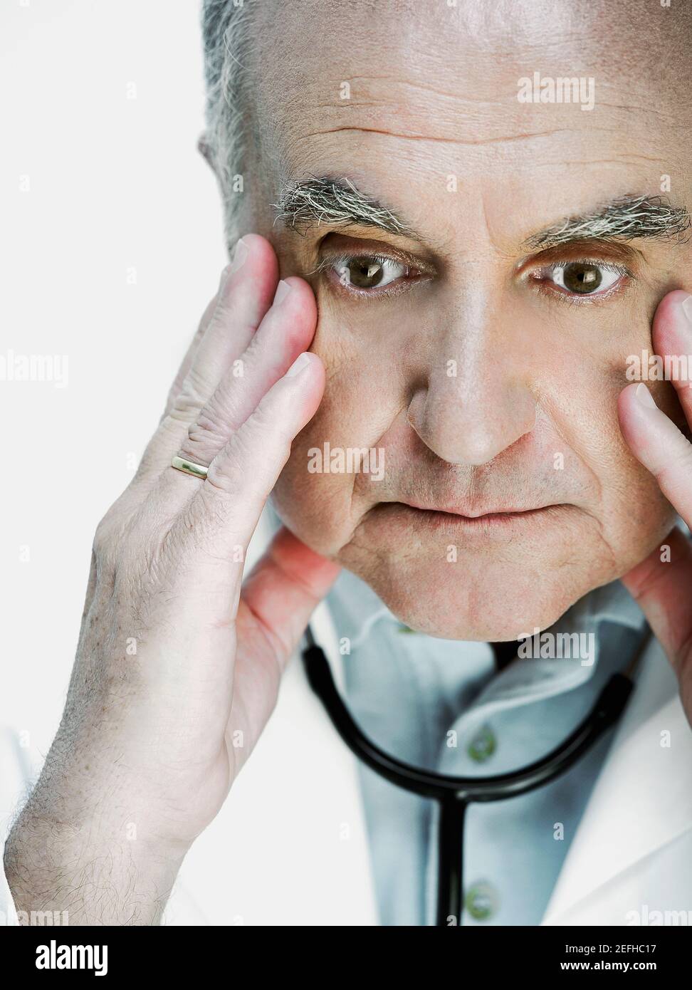 Serious senior head doctor hi-res stock photography and images - Alamy