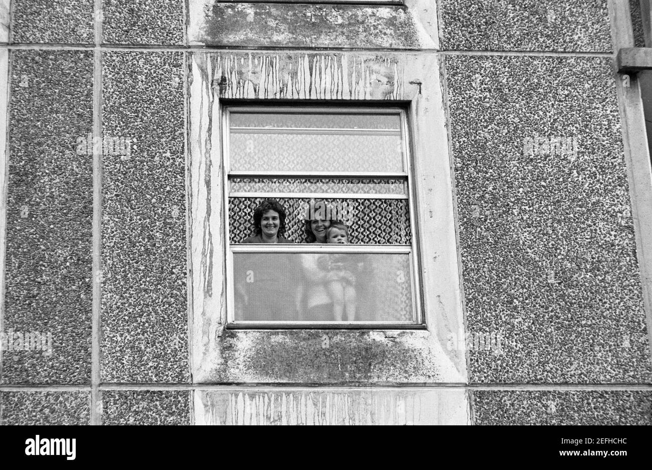 women with toddler in a window, tower block, Ballymun, June 01, 1986 ...