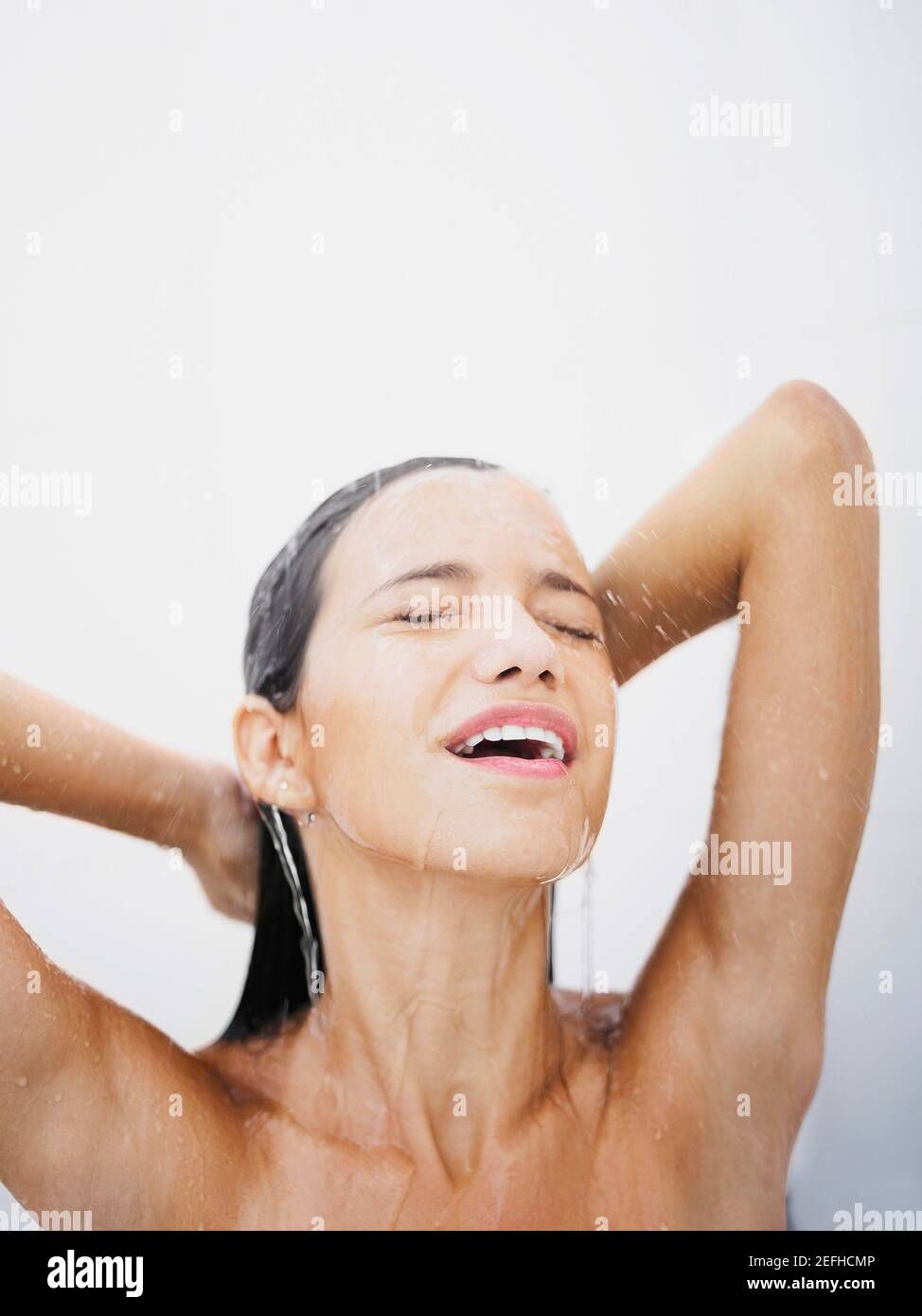 Woman having a shower hi-res stock photography and images - Alamy