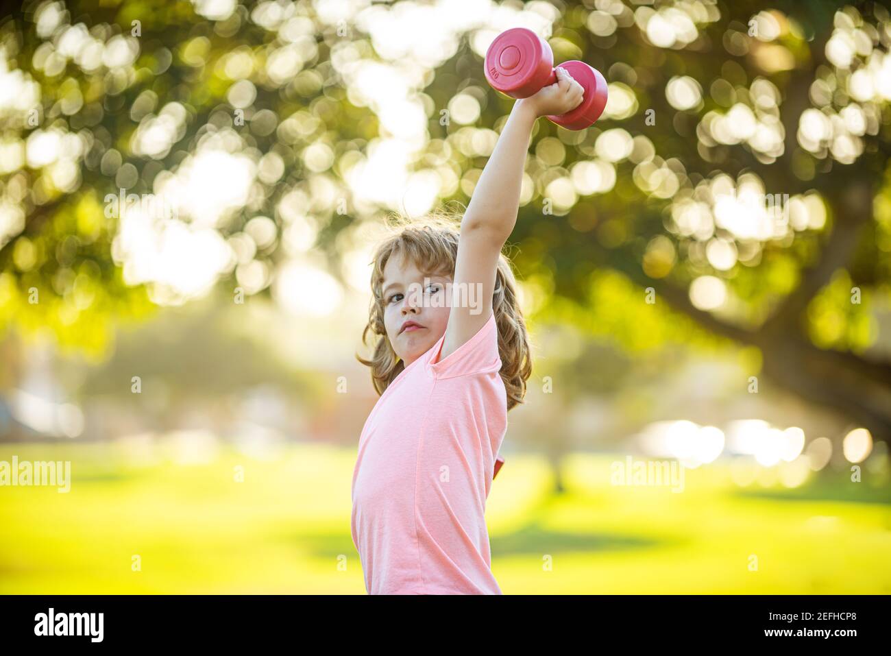 Kids sport boy exercising hi-res stock photography and images - Alamy
