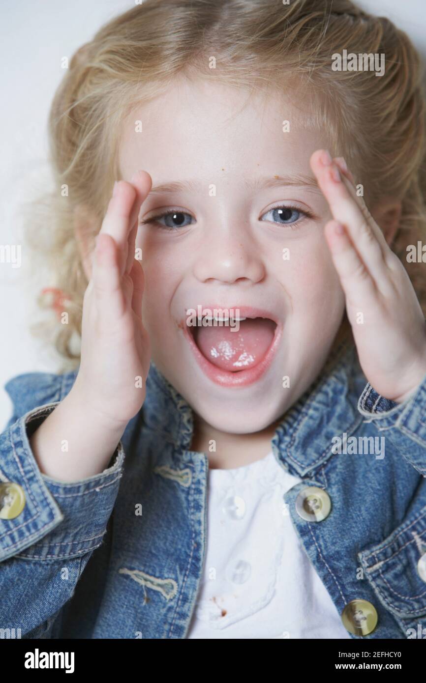 Portrait of a girl shouting Stock Photo - Alamy