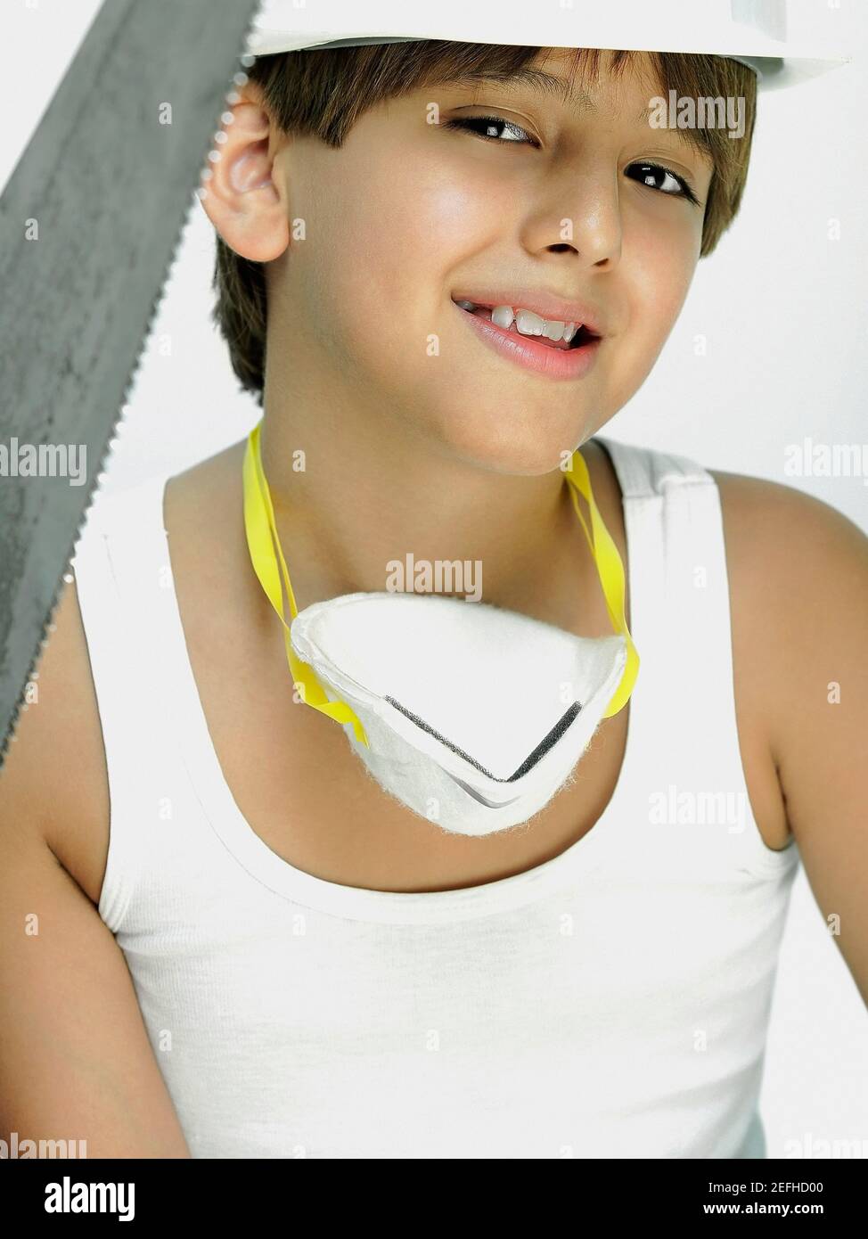 Boy with a saw hi-res stock photography and images - Alamy