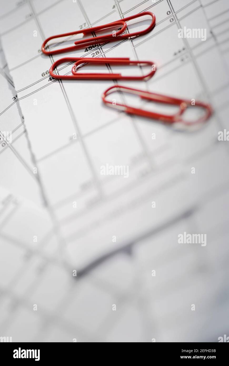 Close up of paper clips on documents Stock Photo - Alamy