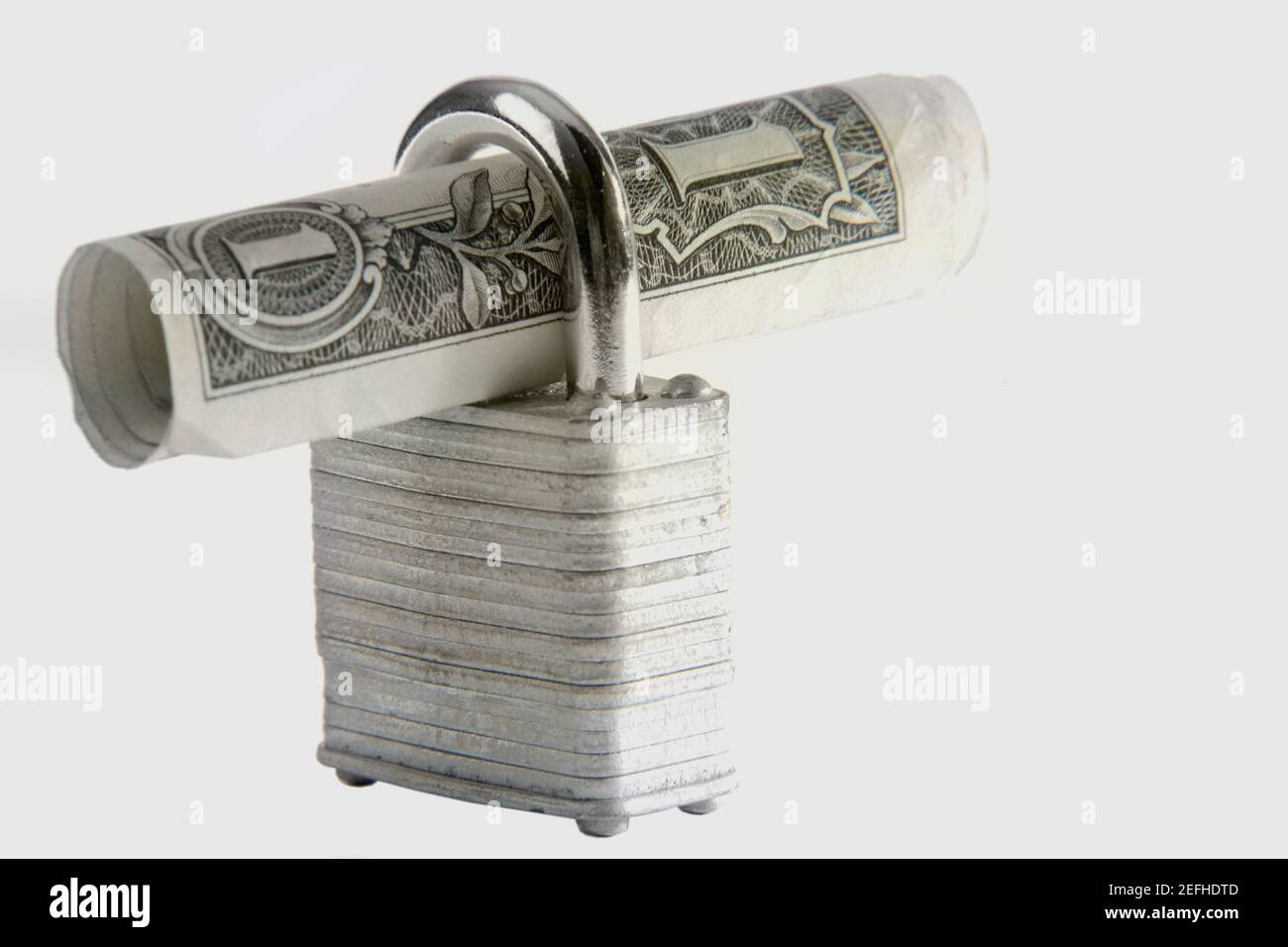 Close up of a combination lock and a dollar bill Stock Photo - Alamy