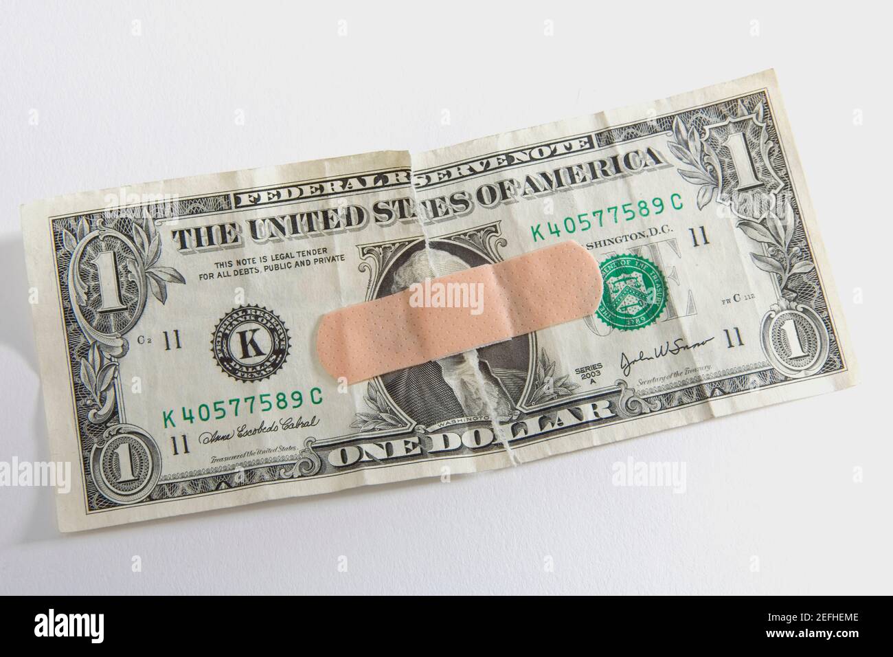 Close up of torn American paper currency fixed with adhesive tape Stock ...