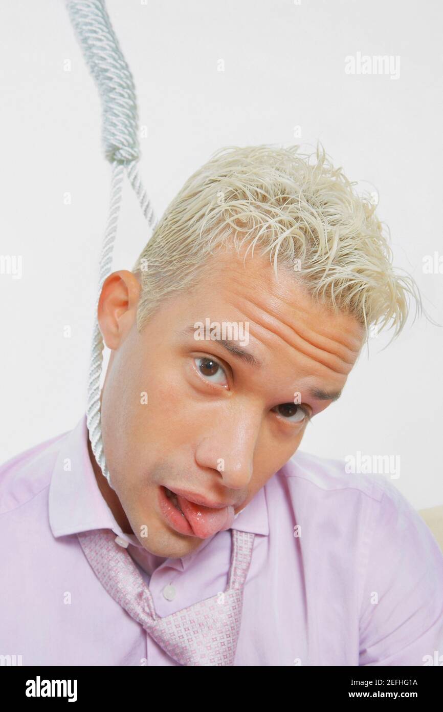 Portrait of a young man with a noose around his neck Stock Photo - Alamy