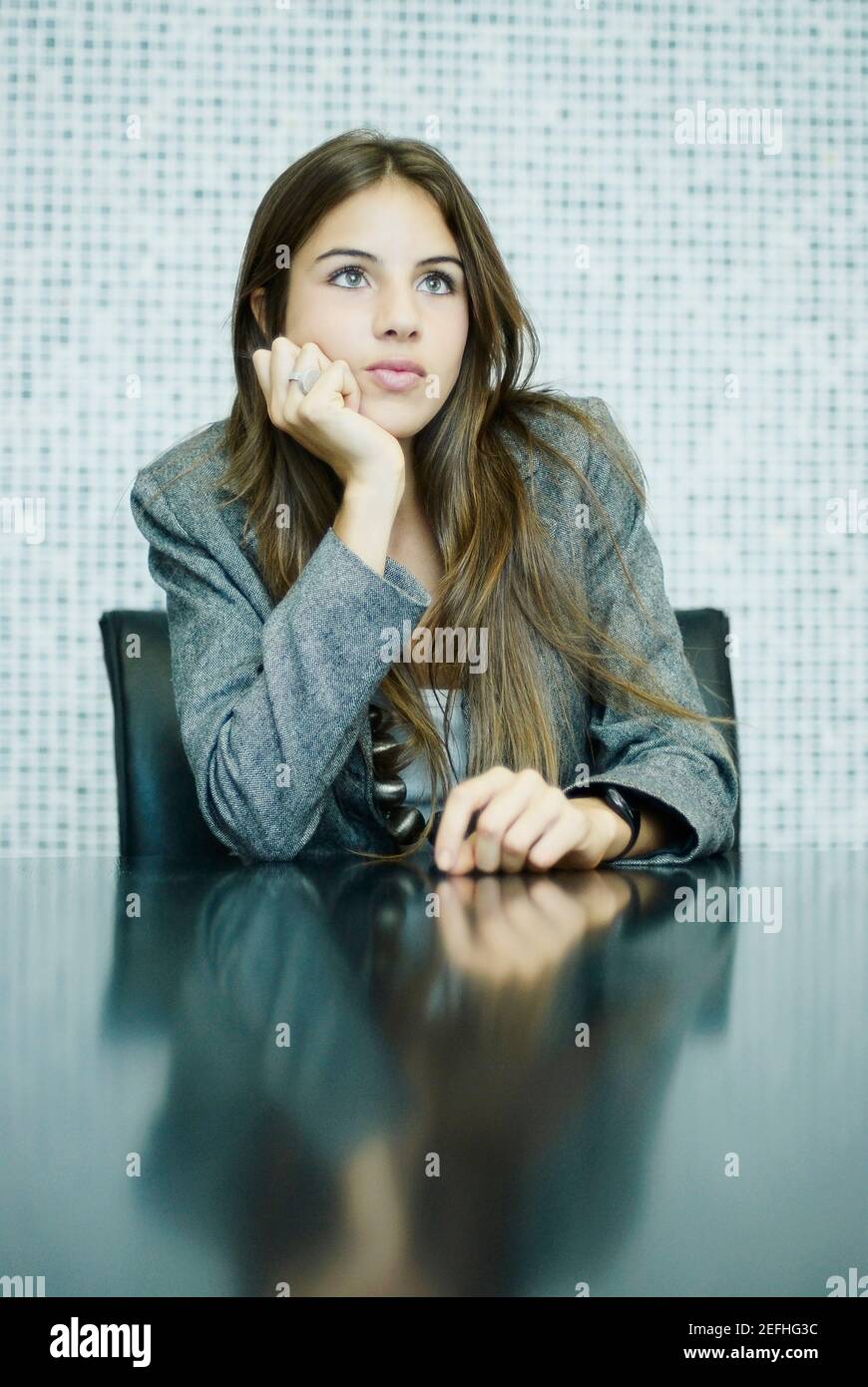Young woman thinking Stock Photo - Alamy