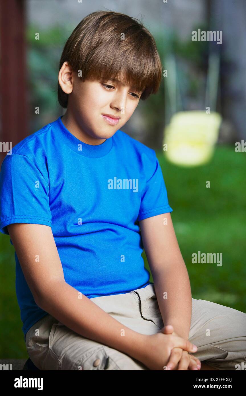 Tween boy thinking hi-res stock photography and images - Alamy
