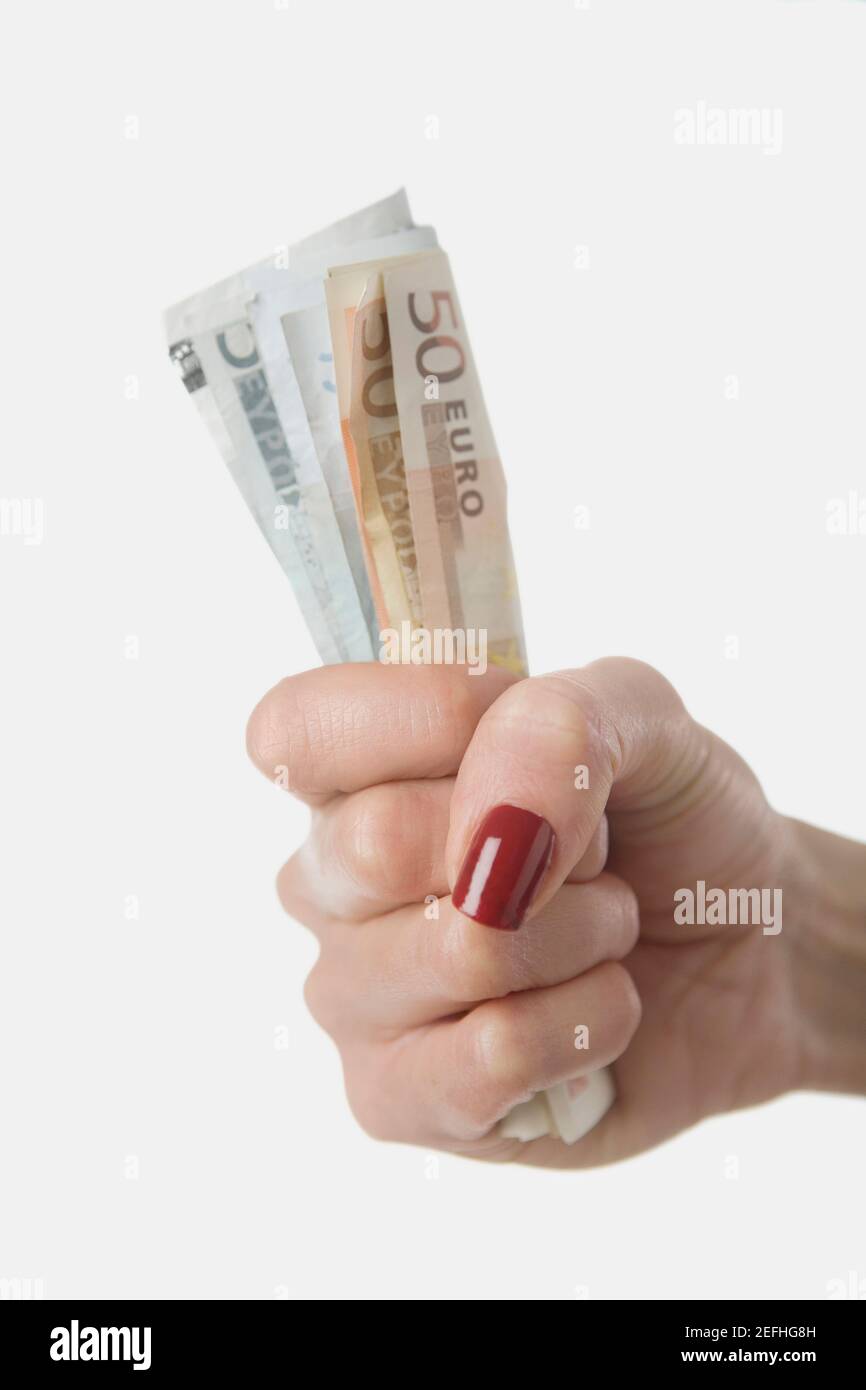 Hand holding bank notes hi-res stock photography and images - Alamy