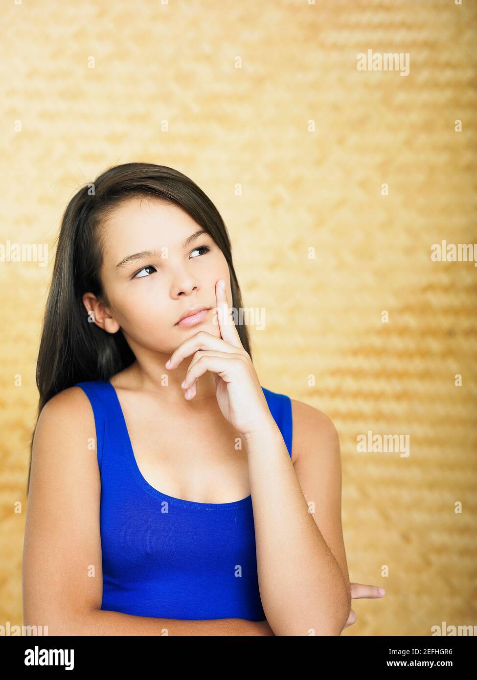 Close up of a teenage girl thinking Stock Photo - Alamy