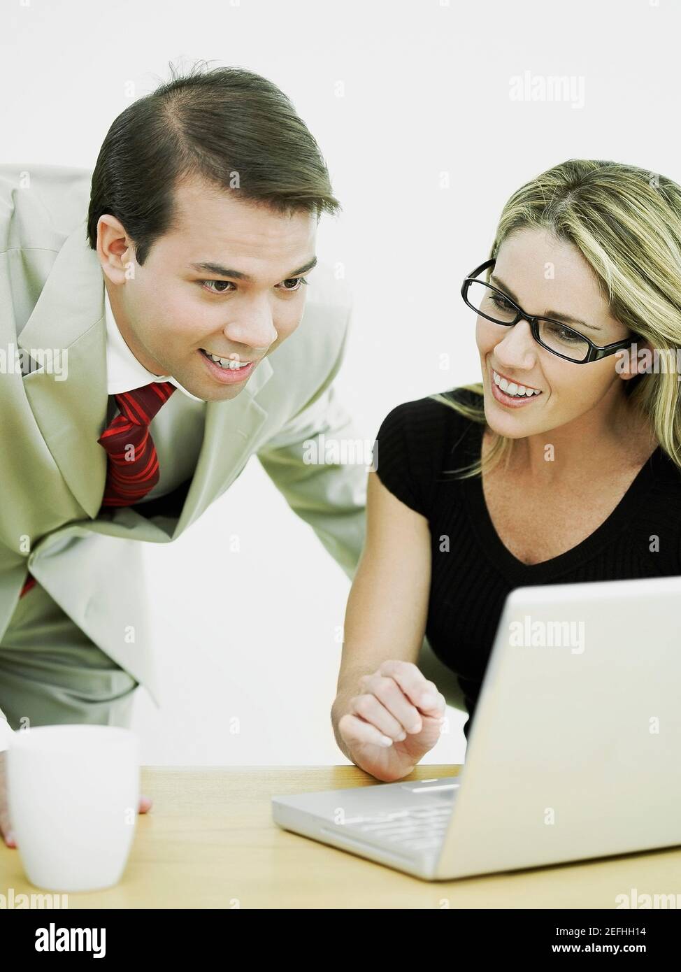 Woman bending over head down hi-res stock photography and images - Alamy