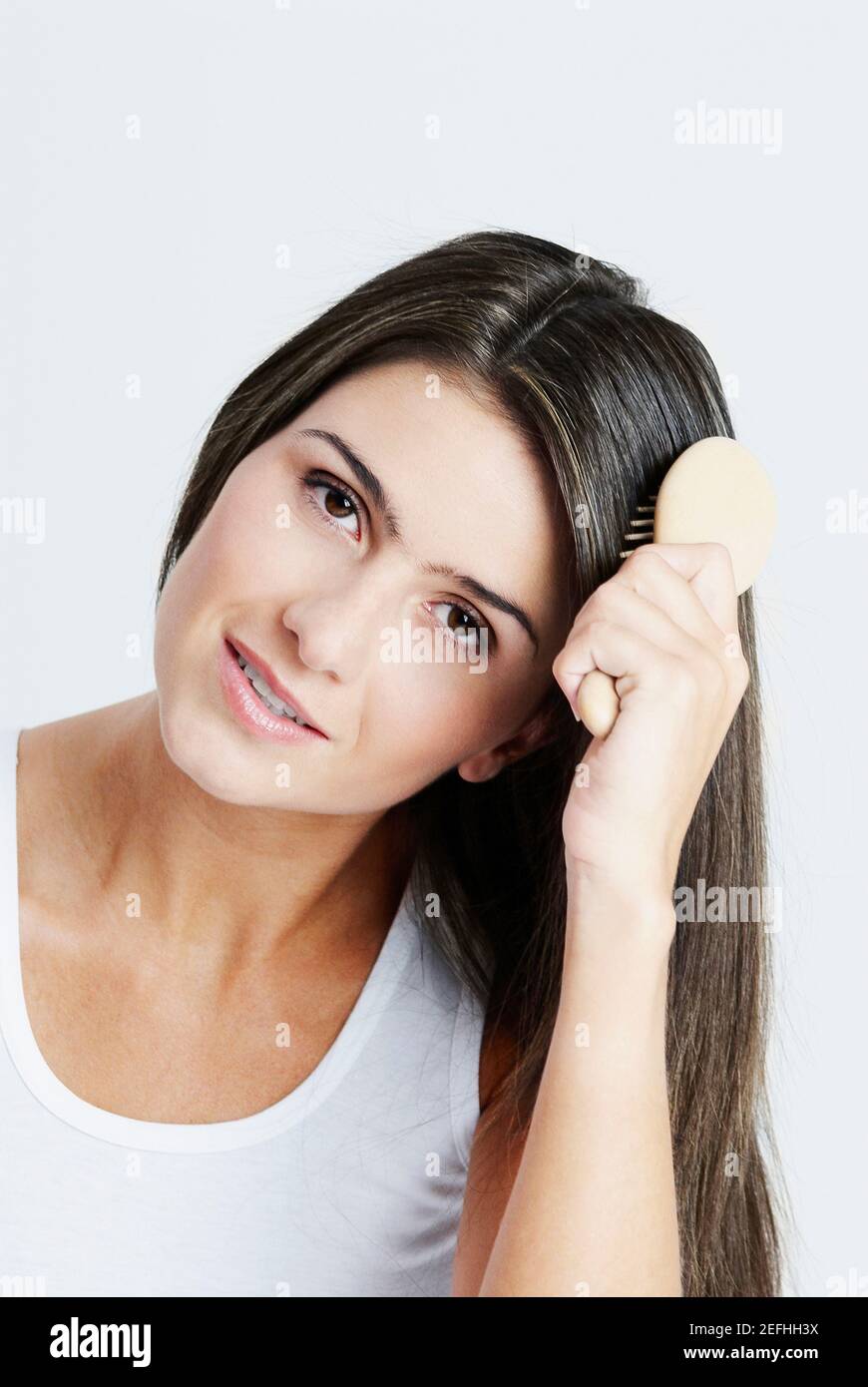 Woman combing clothing hi-res stock photography and images - Alamy