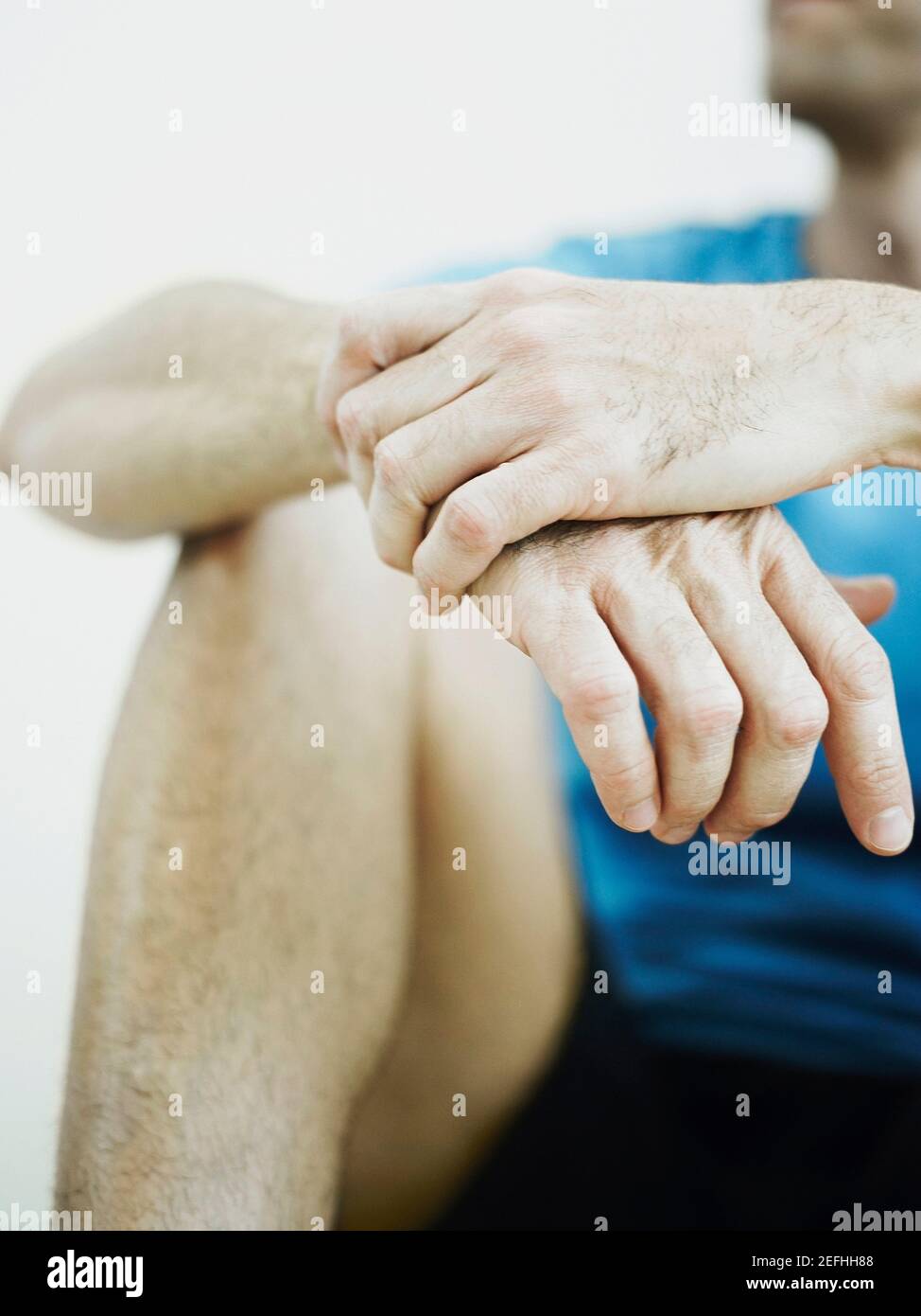 Hugging knees hi-res stock photography and images - Alamy