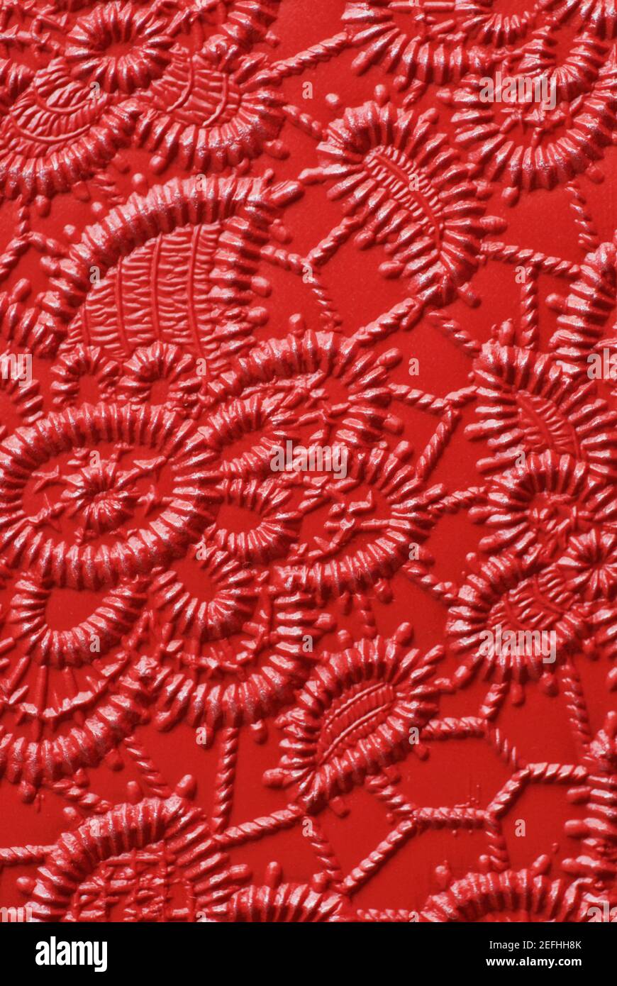 Close up of an embossed floral design Stock Photo - Alamy