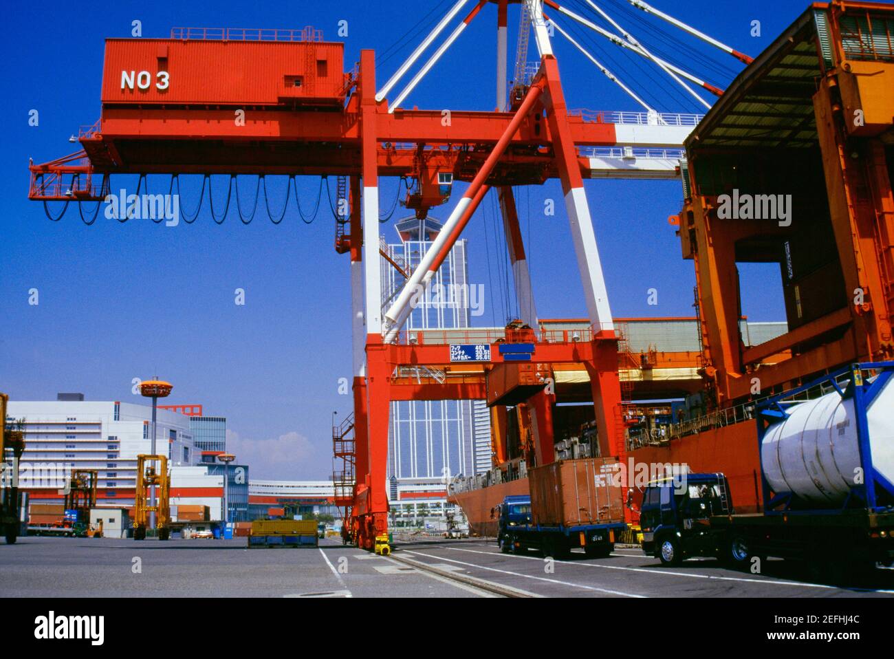 Low angle view of cranes at a port, Nanko Port, Osaka, Japan Stock ...