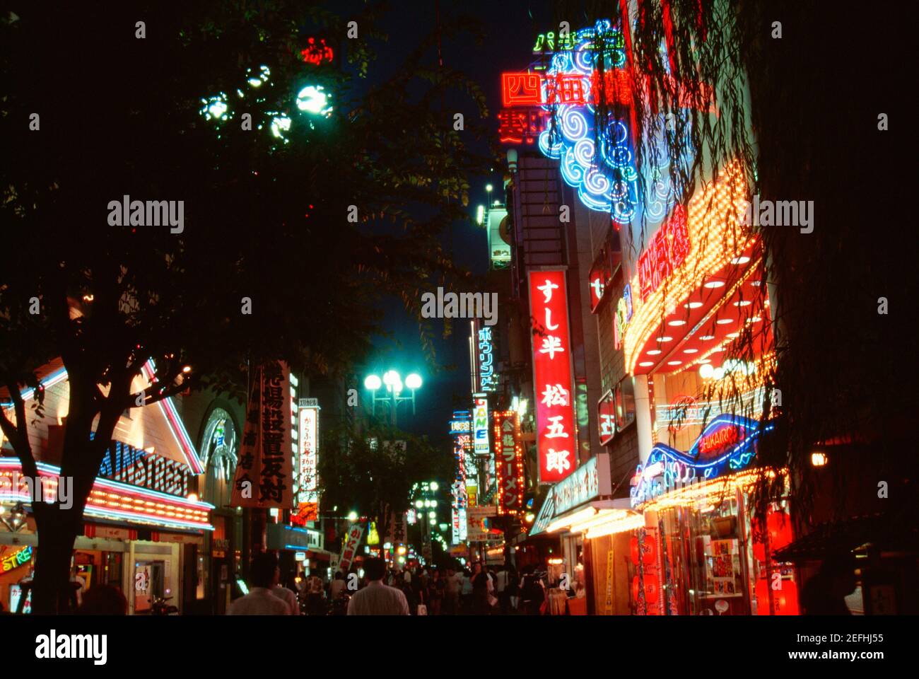 Buildings illuminated at night, Osaka, Japan Stock Photo - Alamy