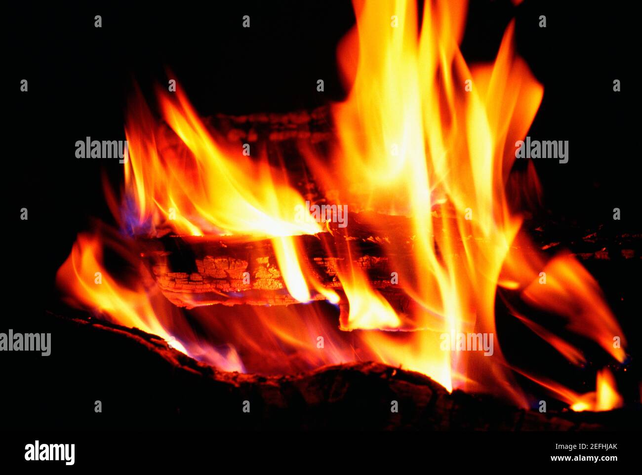Close-up of a log fire Stock Photo - Alamy